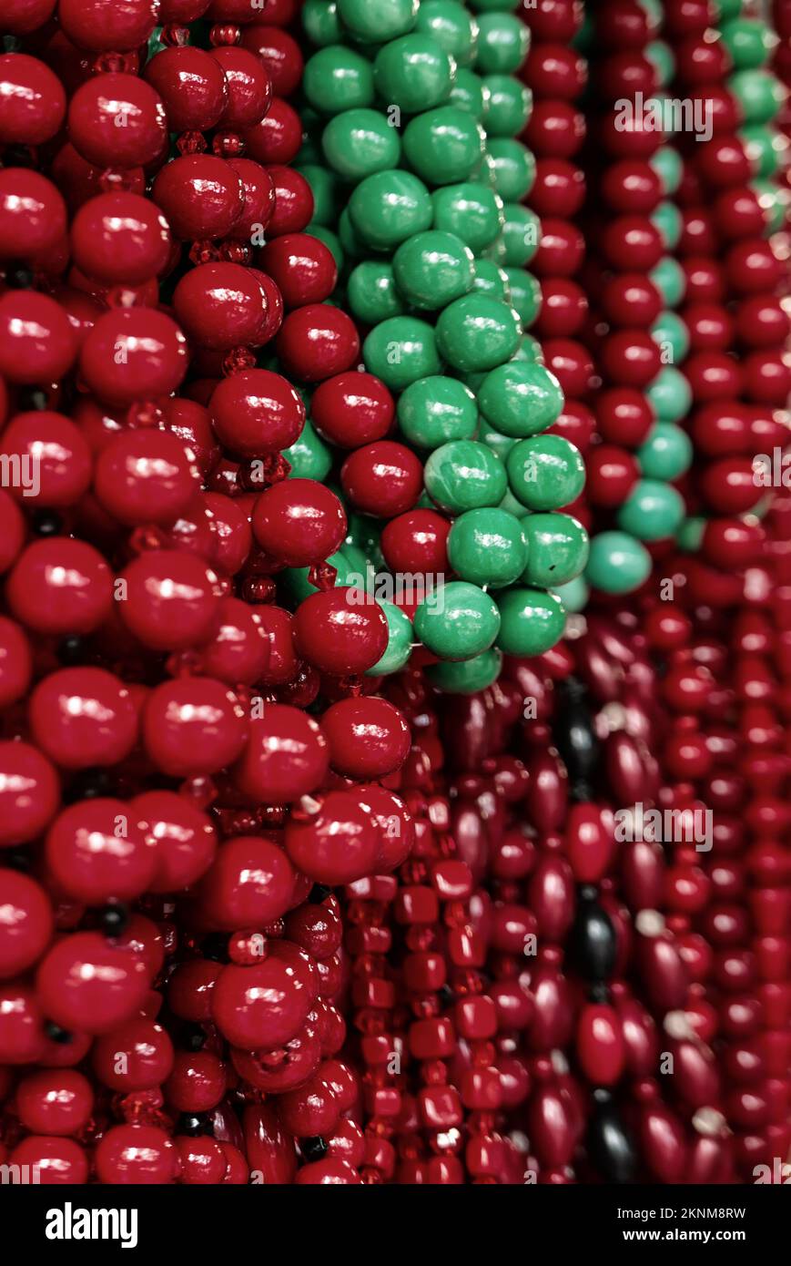 Wooden red beads on the market Stock Photo - Alamy