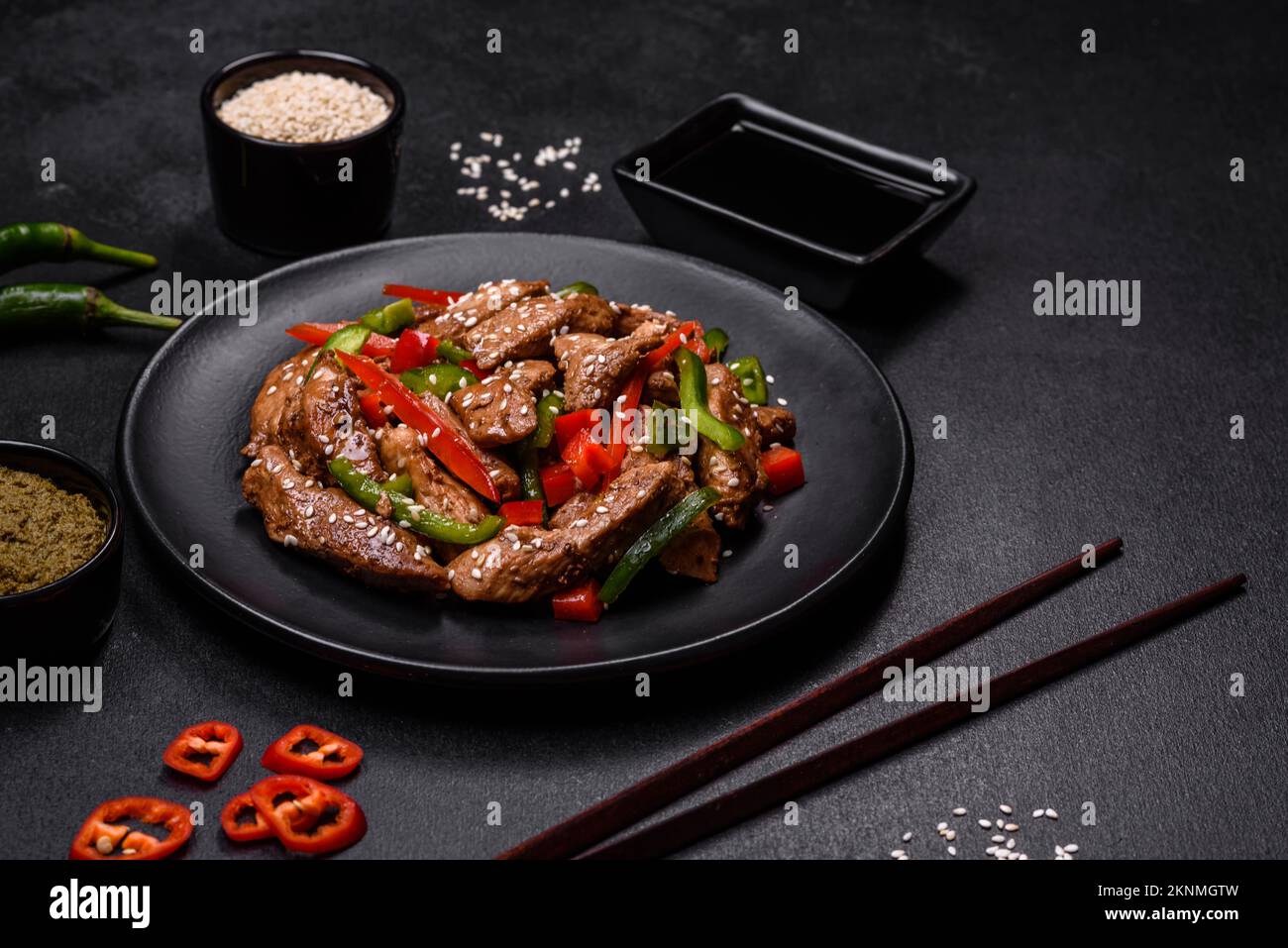 Delicious Asian teriyaki meat with red and green bell peppers and ...