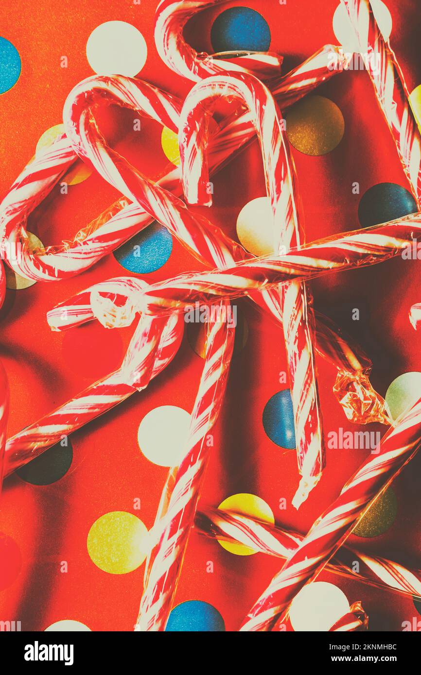 Decorative holiday still-life on a mix of red and white stripe ...