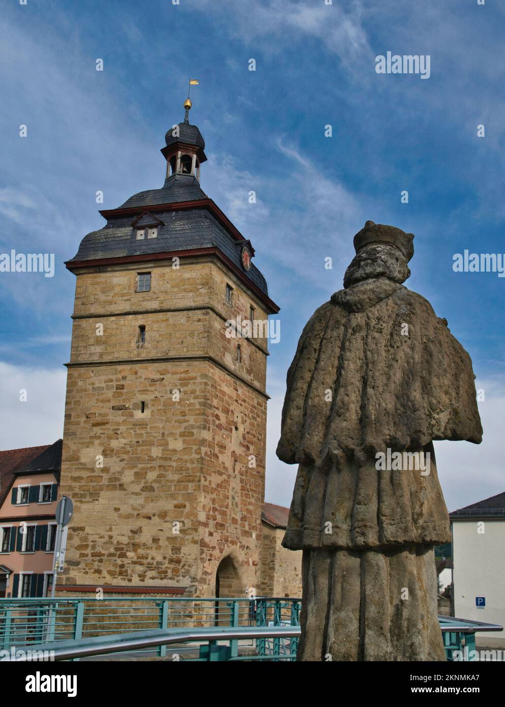 Stone statue with town tower (also known as Bamberg Gate) in background ...