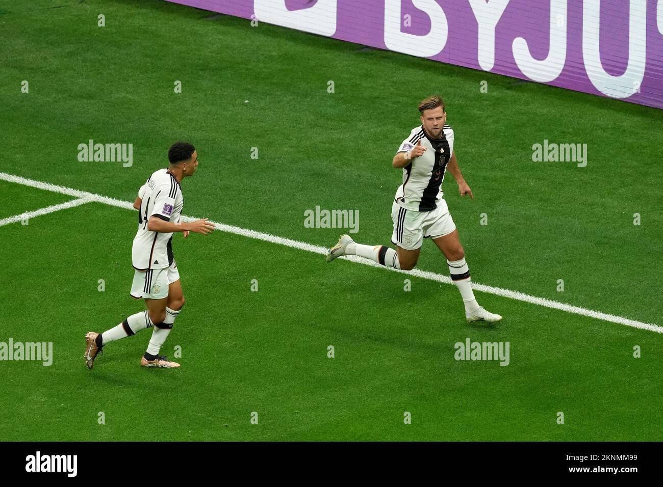 Germany’s Niclas Fullkrug celebrates after scoring their sides first ...