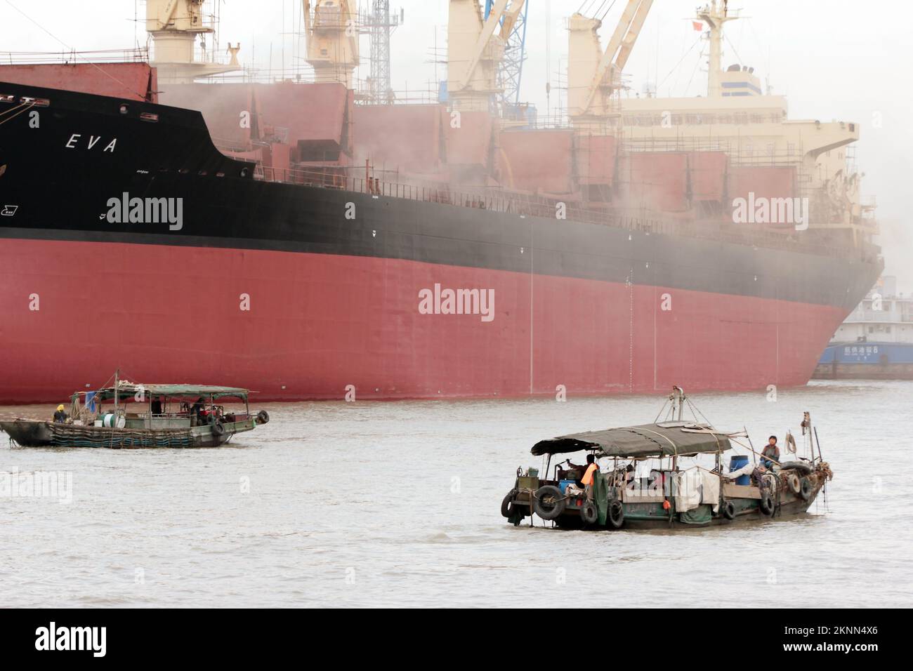 A traditional vessel and a newly constructed ships, Huangpu river ...