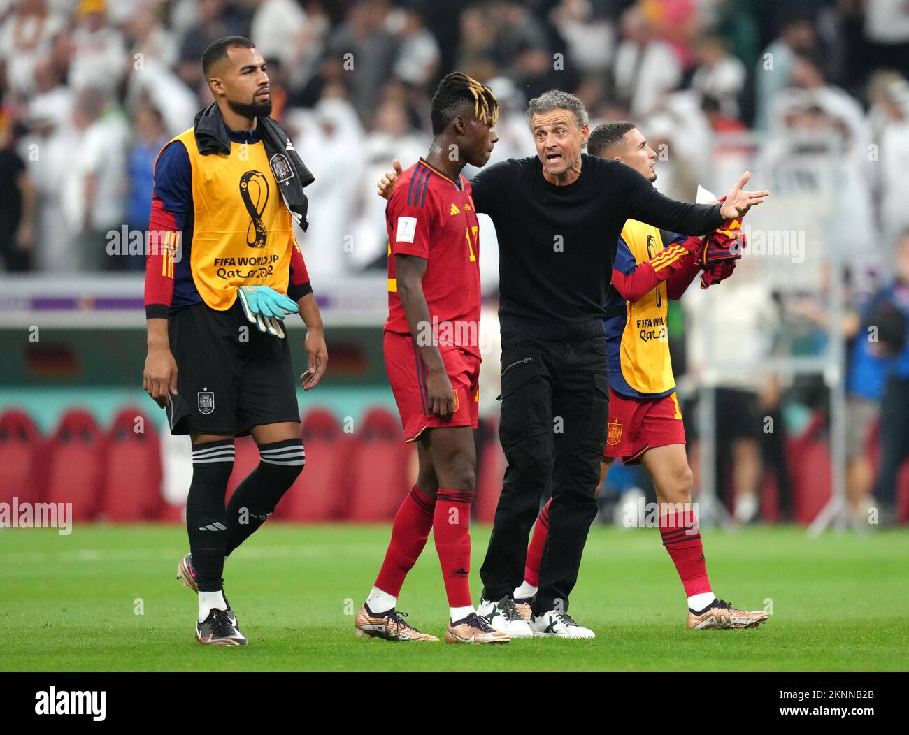 Spain manager Luis Enrique speaks to Spain's Nico Williams following ...