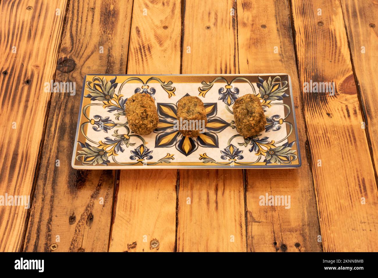 Croquettes with a crunchy texture and a golden color. They are ...