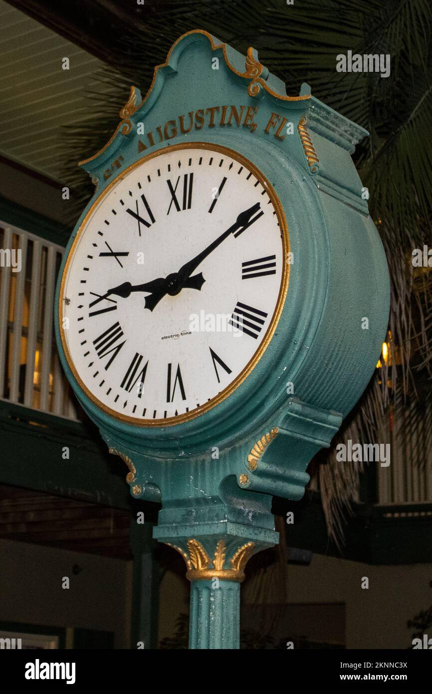 A vertical closeup of a Street Clock in St. Augustine Florida, USA ...
