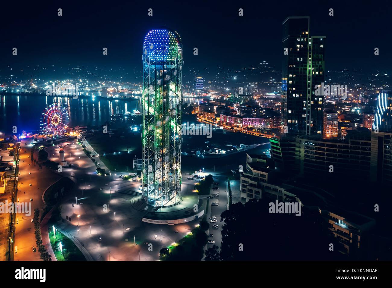 Aerial night view of Batumi city resort embankment in historical town ...