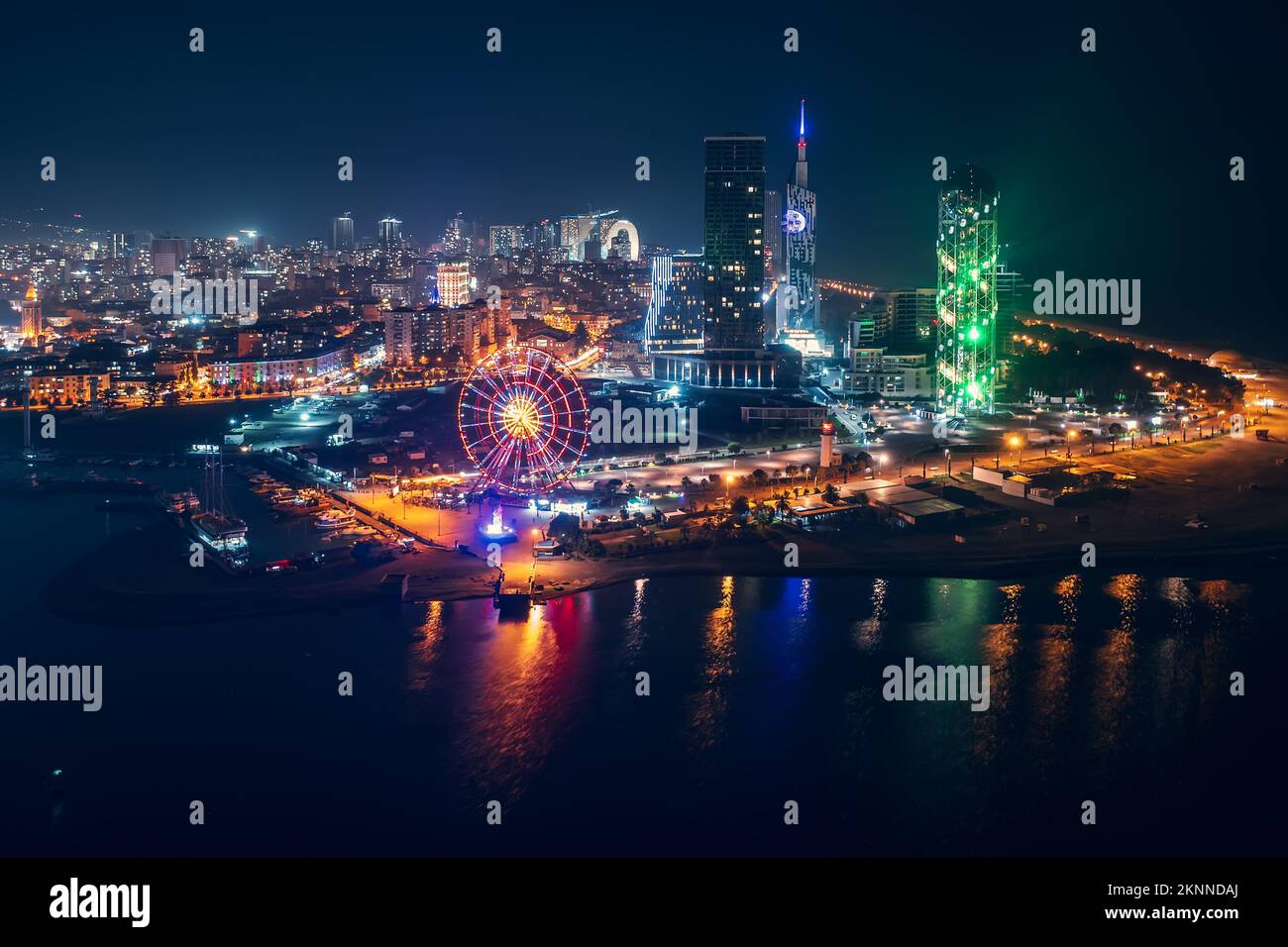 Aerial night view of Batumi city resort embankment in historical town ...