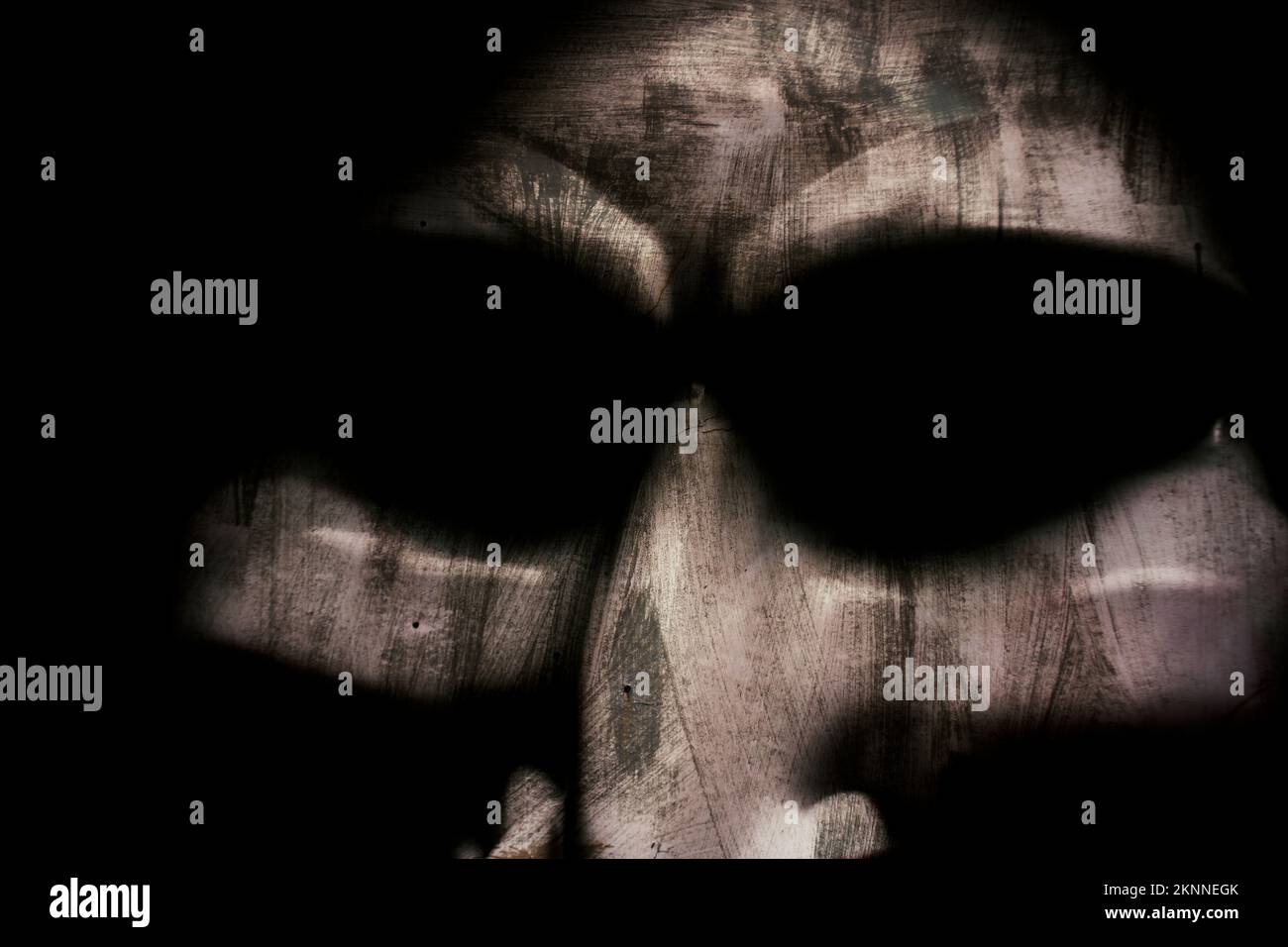 Moody black chaos behind the blank eyes of a night terror closeup. They ...