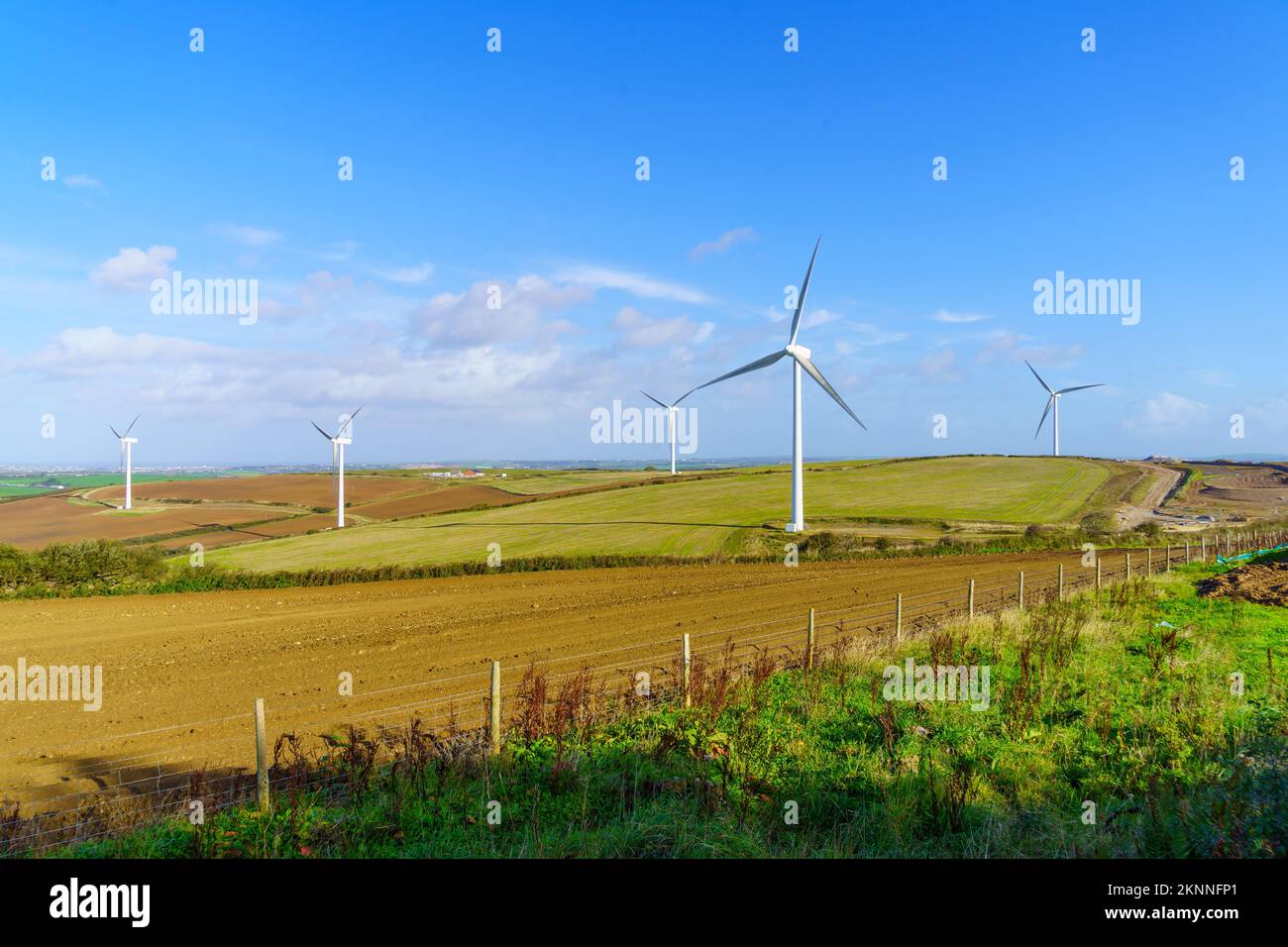 View of wind turbines farm and countryside, in Cornwall, England, UK ...