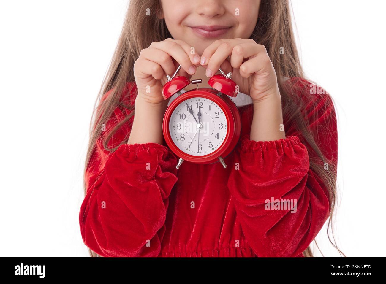 Christmas woman with red alarm clock, smiling girl in red Santa claus ...