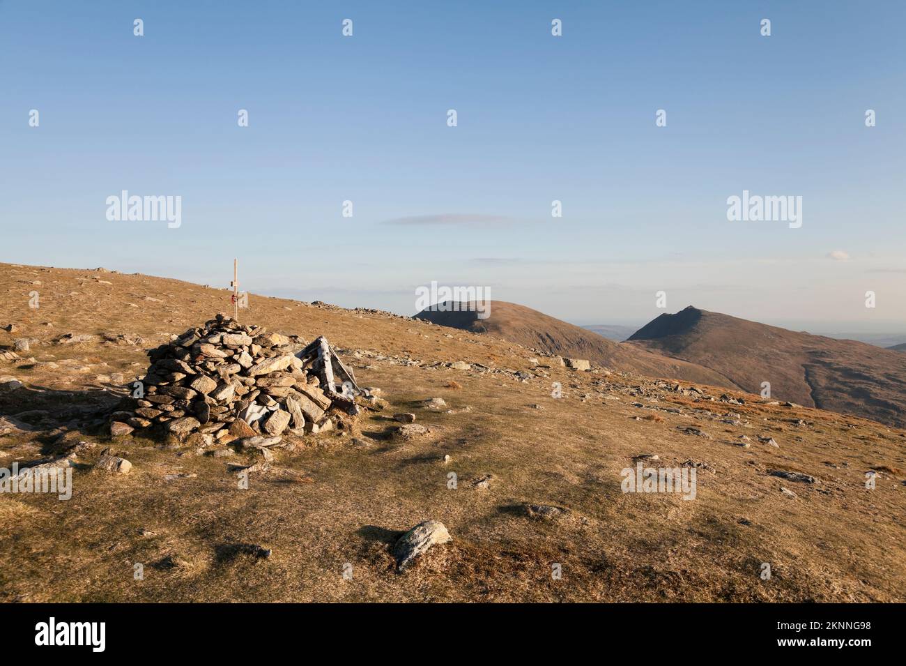 The memorial cairn and cross on Great Carrs, in the southern fells of ...