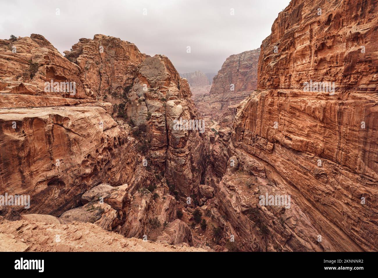Typical landscape at Petra, Jordan, rocky walls around narrow canyon ...
