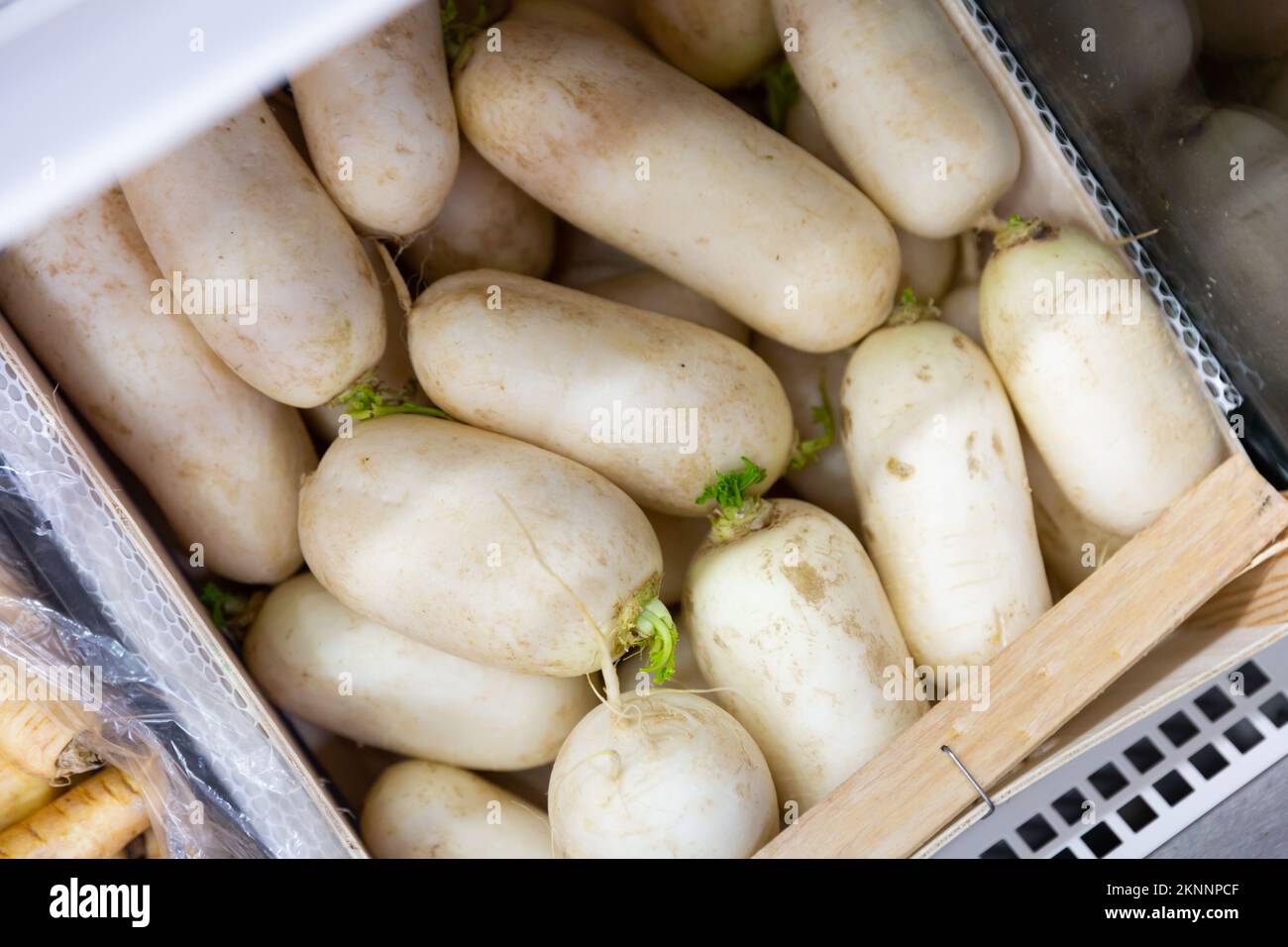 Fresh organic radishes in boxes at market Stock Photo - Alamy