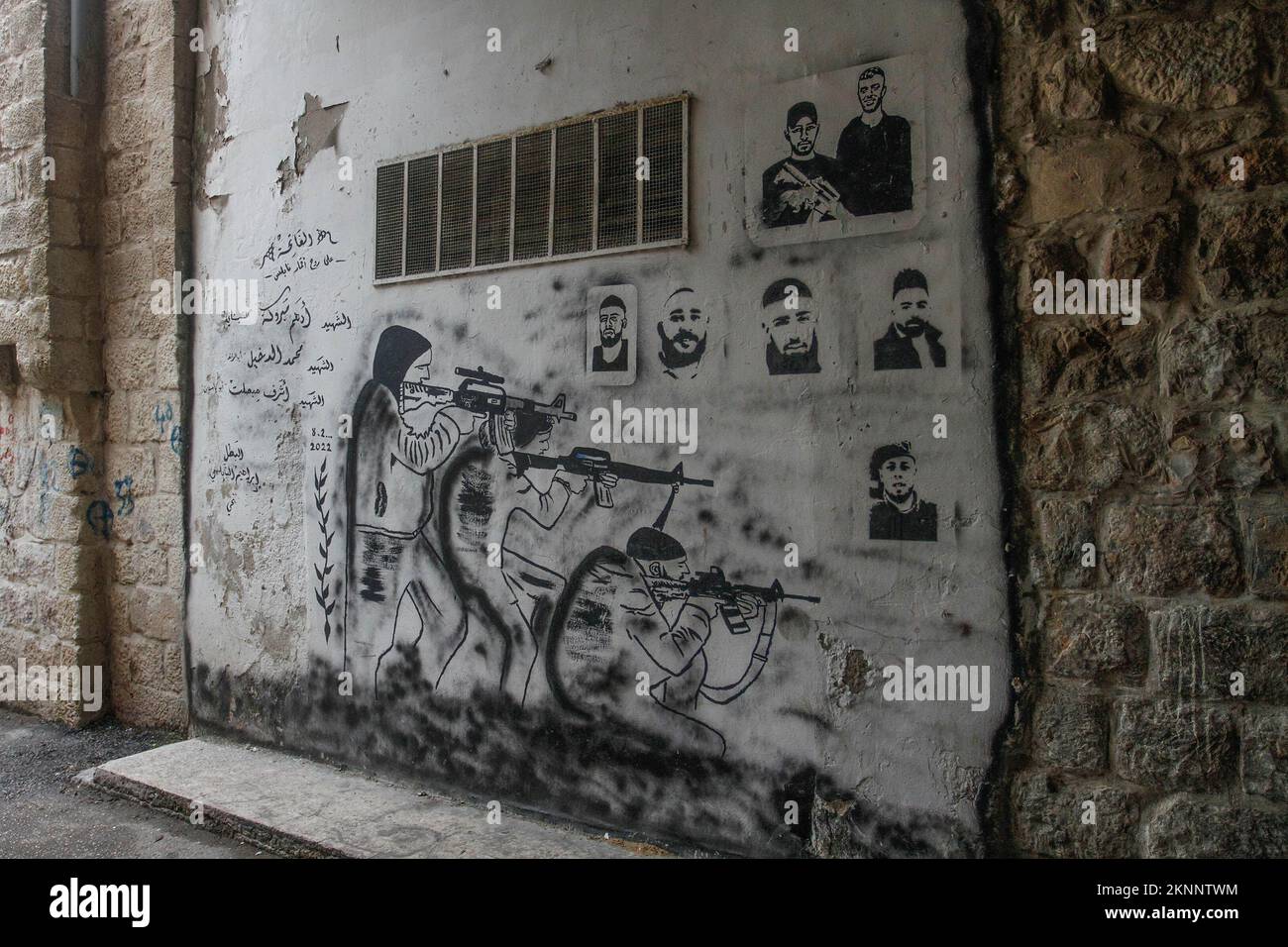 Nablus, Palestine. 27th Nov, 2022. A view of a mural depicting armed ...