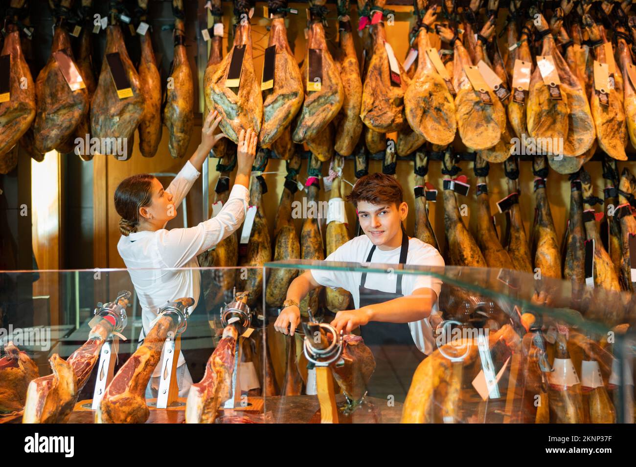 Butcher shop owner assistant hi-res stock photography and images - Alamy