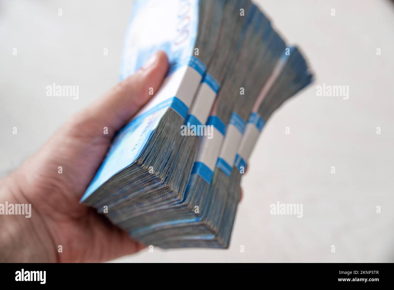 Russian rubles in the male hands, cash pay, salary or shopping concept ...