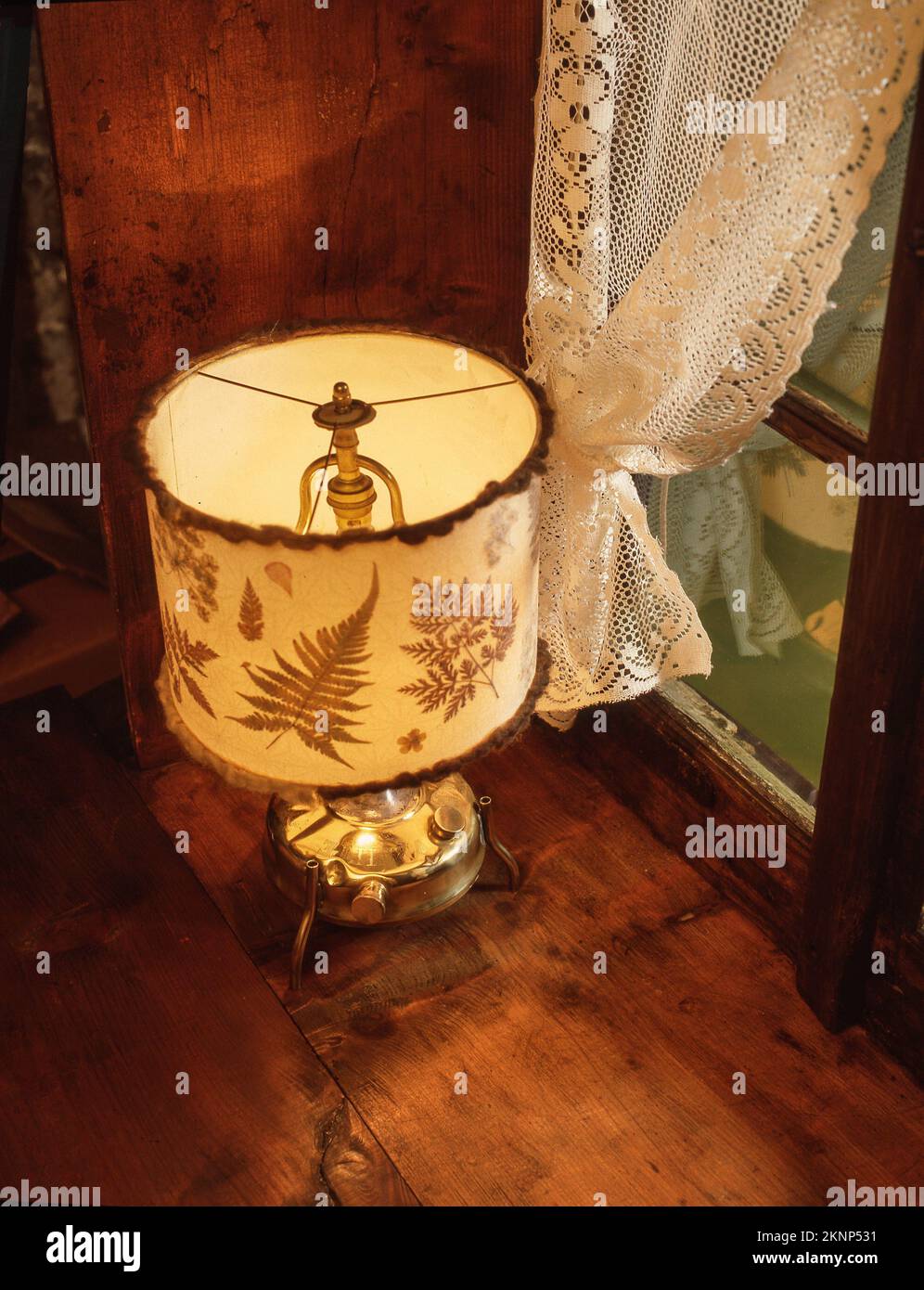 A vintage lamp on the window platform Stock Photo - Alamy