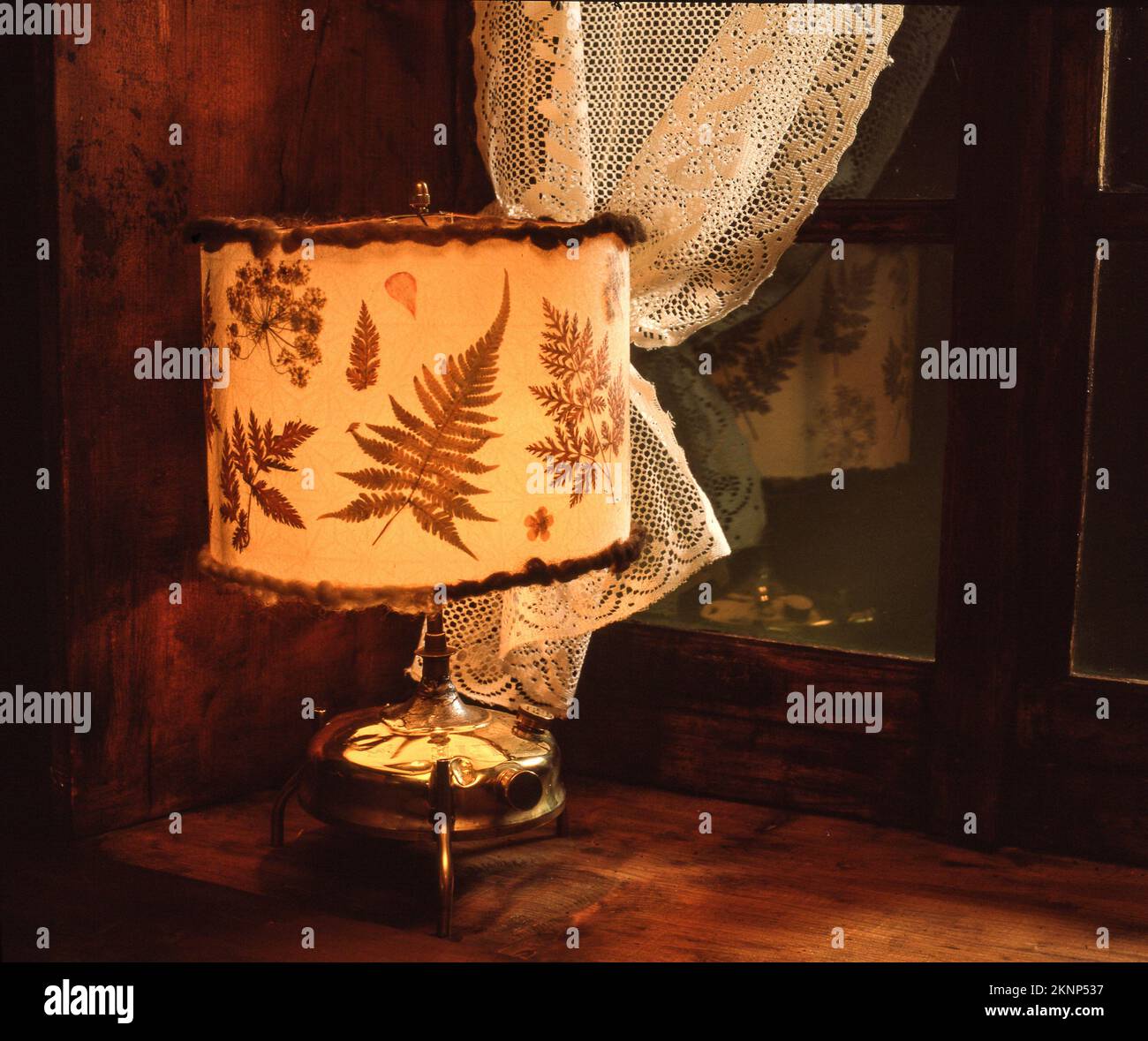 A vintage lamp on the window platform Stock Photo - Alamy