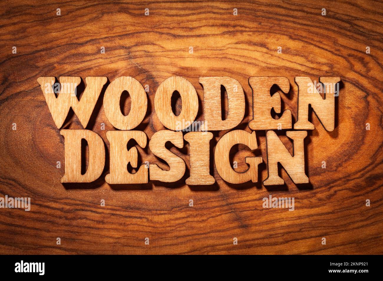 Wooden Design - Text on wood close up Stock Photo - Alamy
