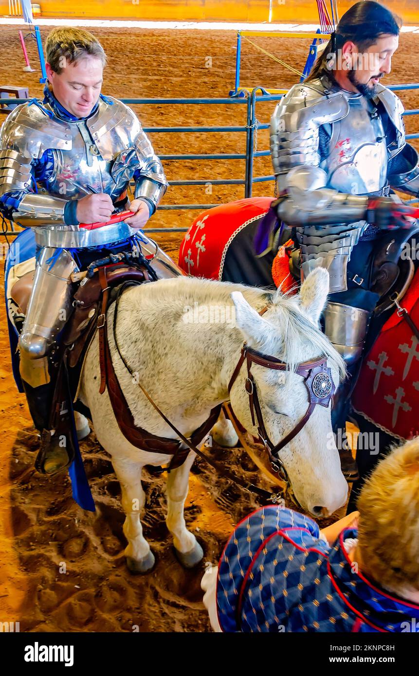 Jousters in silver armor sign autographs during the annual Celtic Music ...