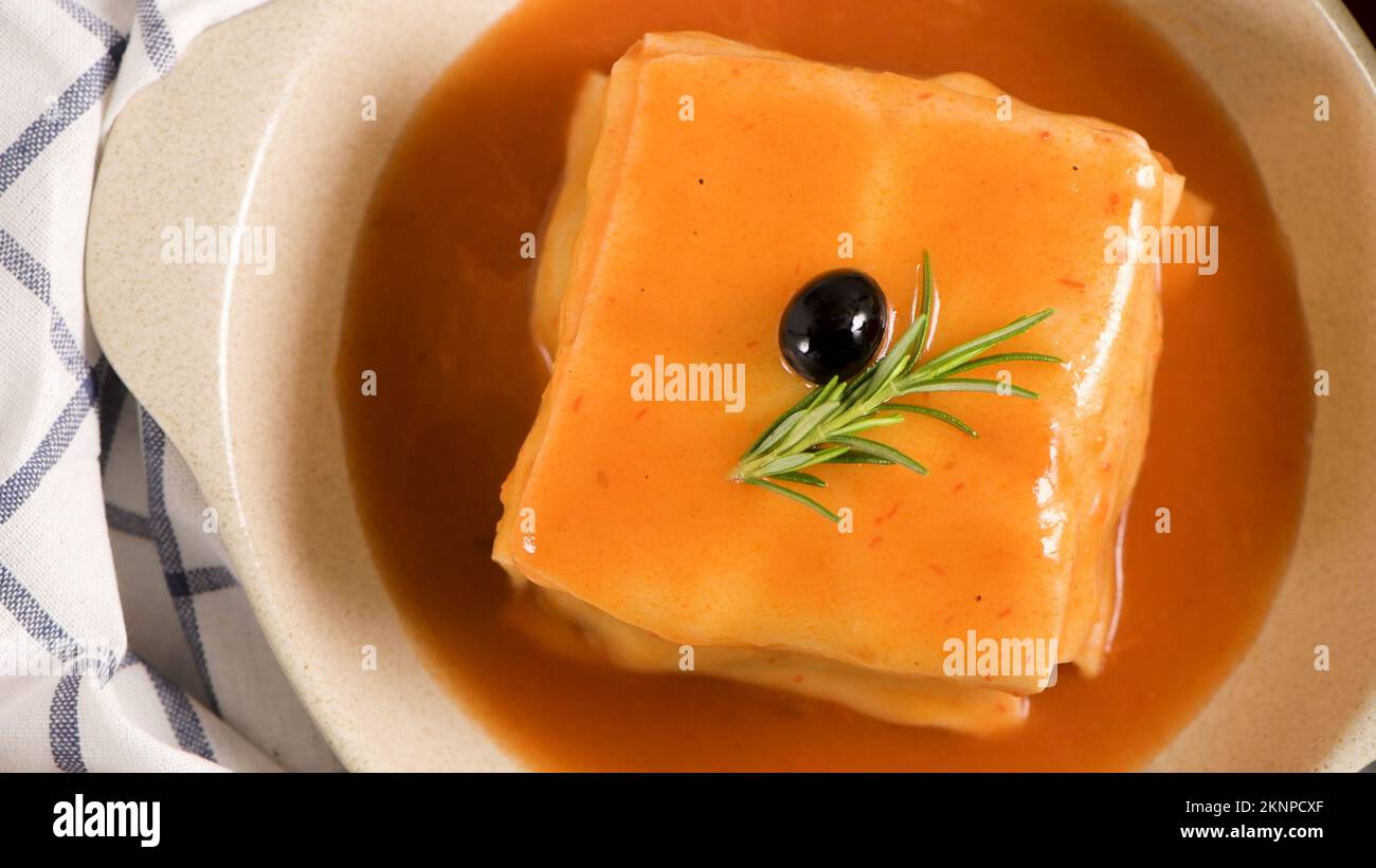 Traditional Portuguese snack food. Francesinha sandwich of bread ...