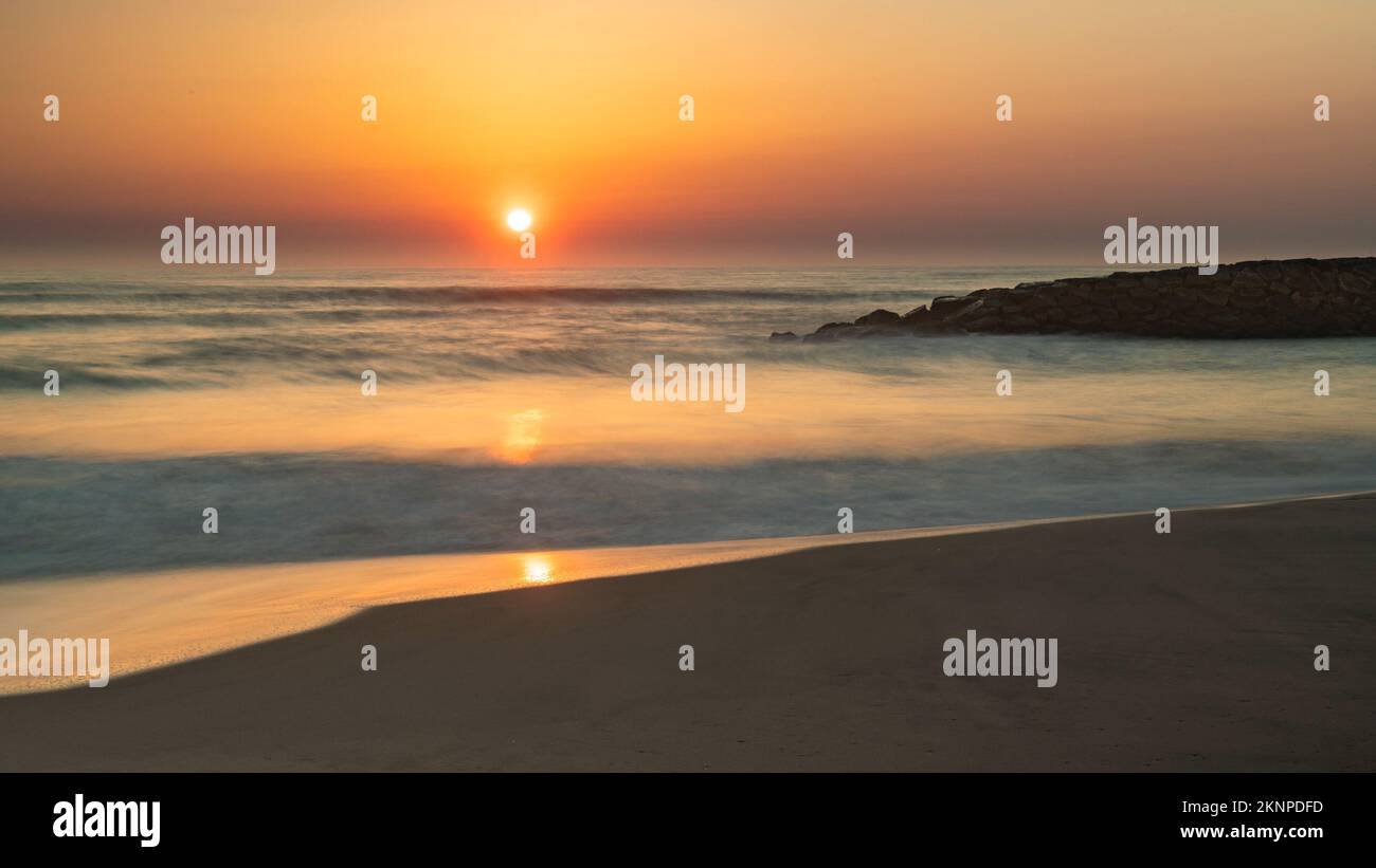Landscape of Furadouro beach, Portugal at sunset Stock Photo - Alamy