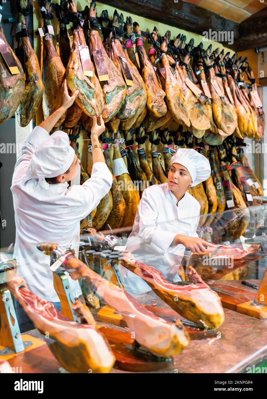 Butcher shop owner assistant hi-res stock photography and images - Alamy