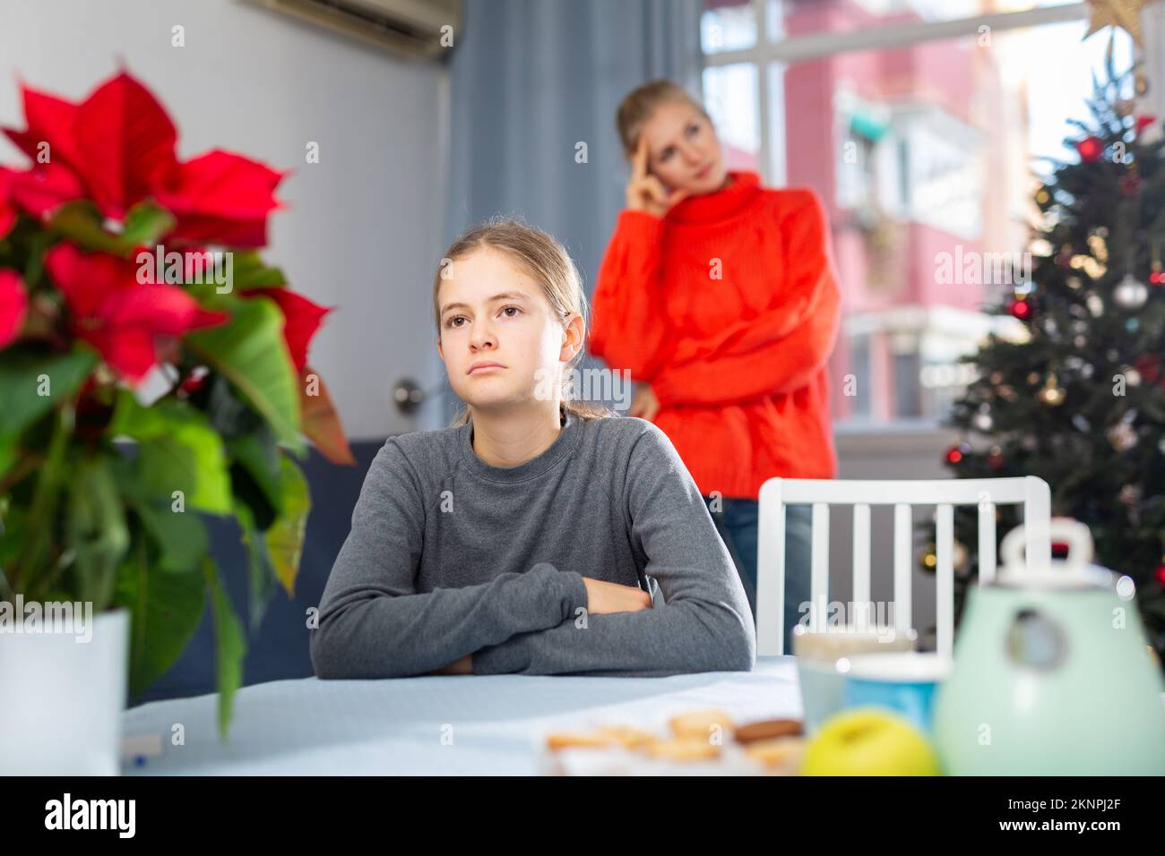 Quarrel between mom and daughter during christmas Stock Photo - Alamy