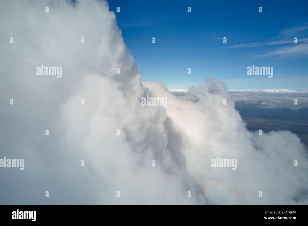 Aerial view from airplane window at high altitude of earth covered with ...