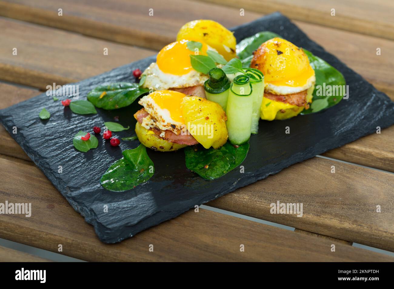 Potato burgers with quail egg Stock Photo - Alamy
