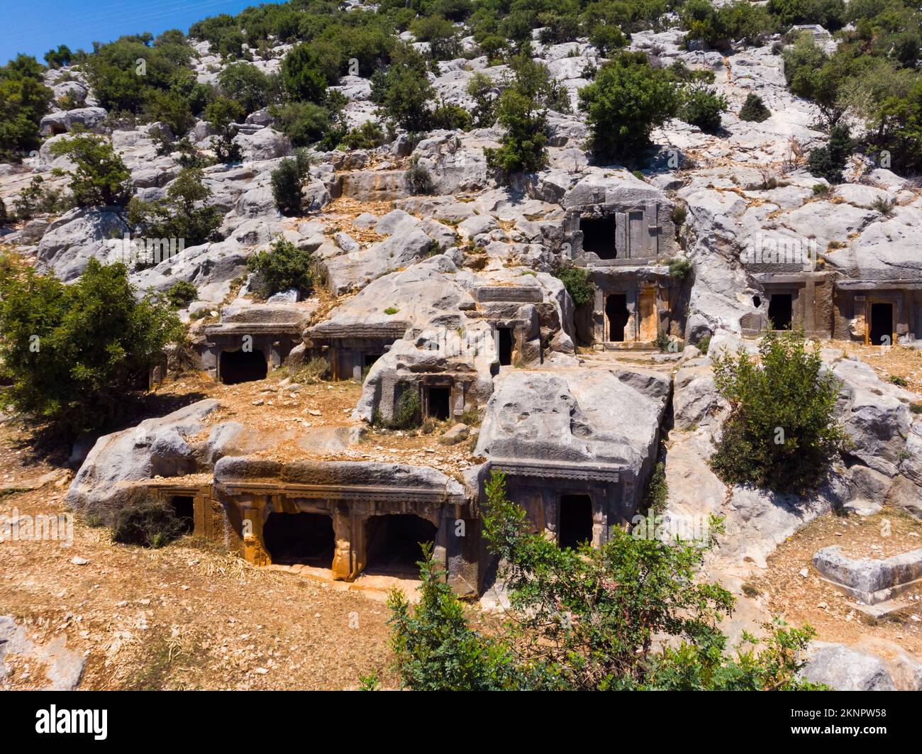 Remains of rock burial chambers in ancient Lycian city of Limyra ...