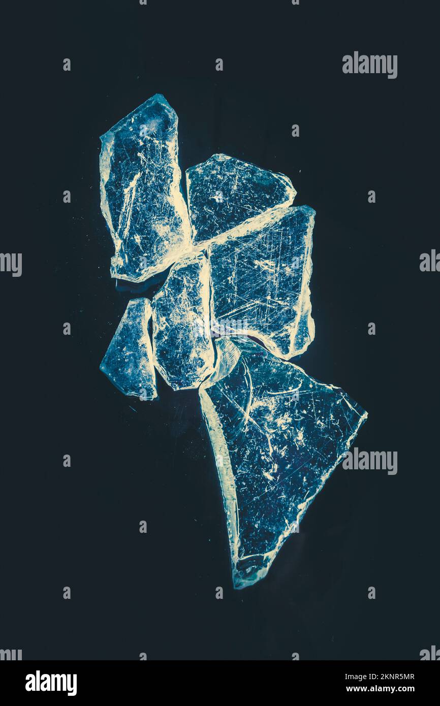 Shattered damaged pieces blue glass hi-res stock photography and images ...