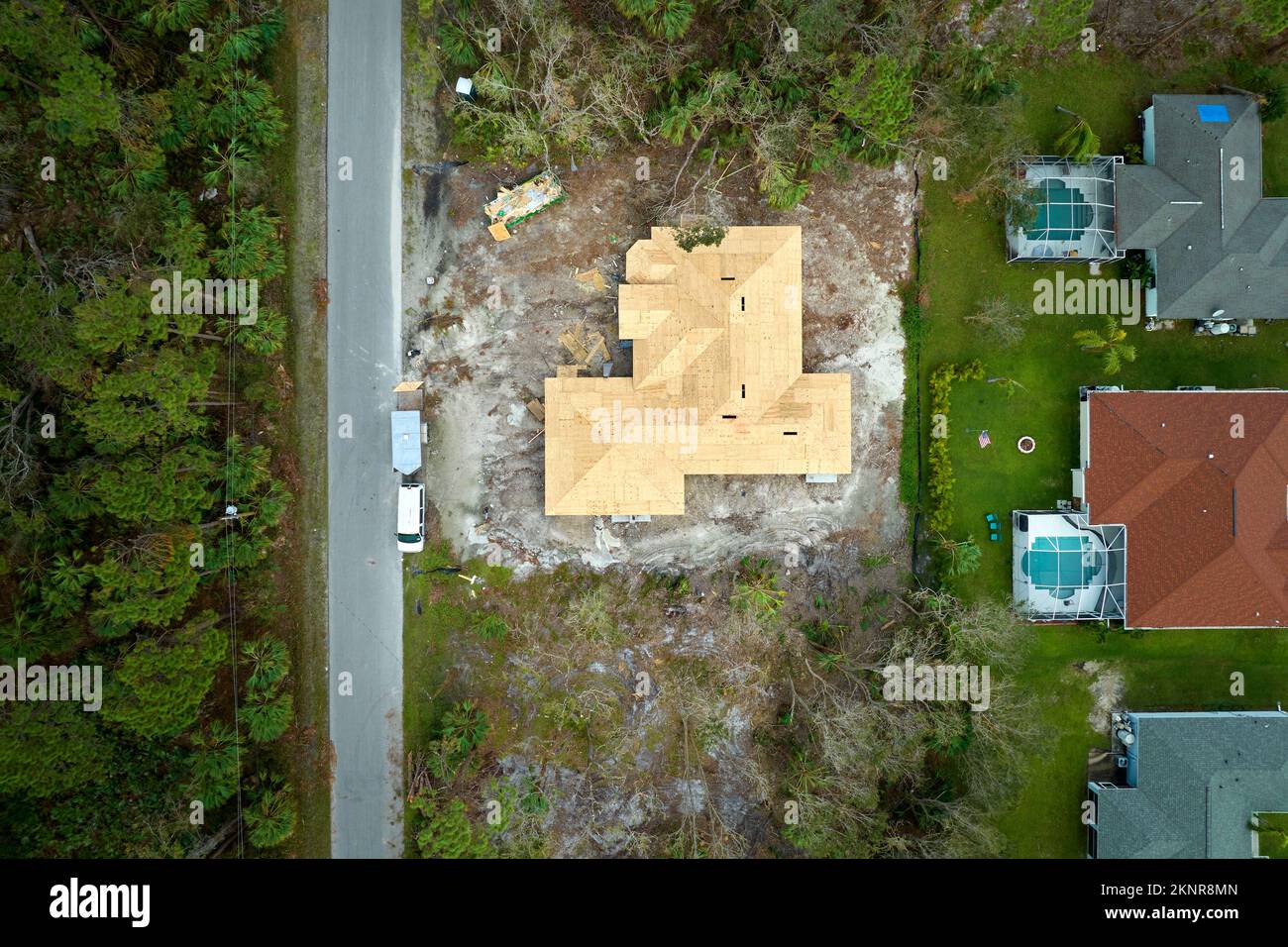 Aerial view of residential private home with wooden roofing structure ...