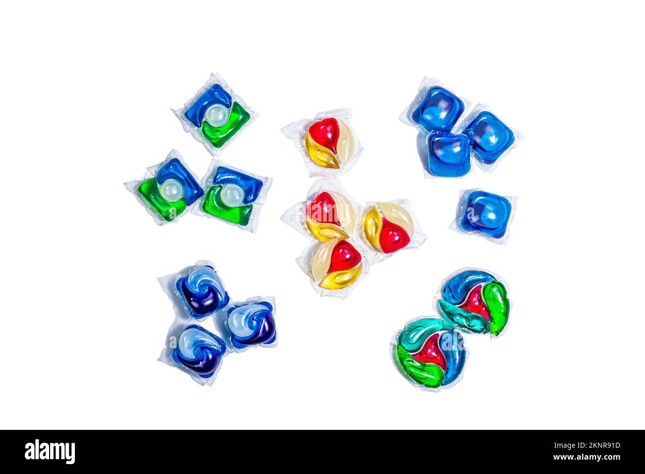 Assorted capsules with detergent for washing machine isolated on white ...