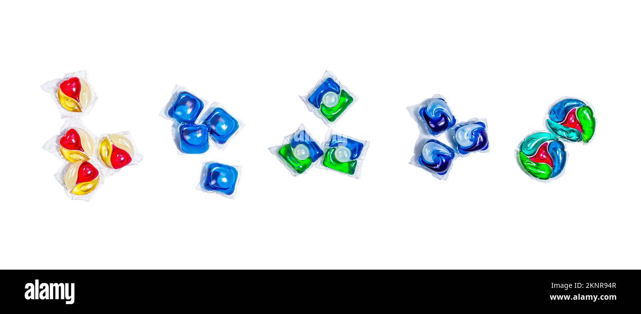 Assorted capsules with detergent for washing machine isolated on white ...