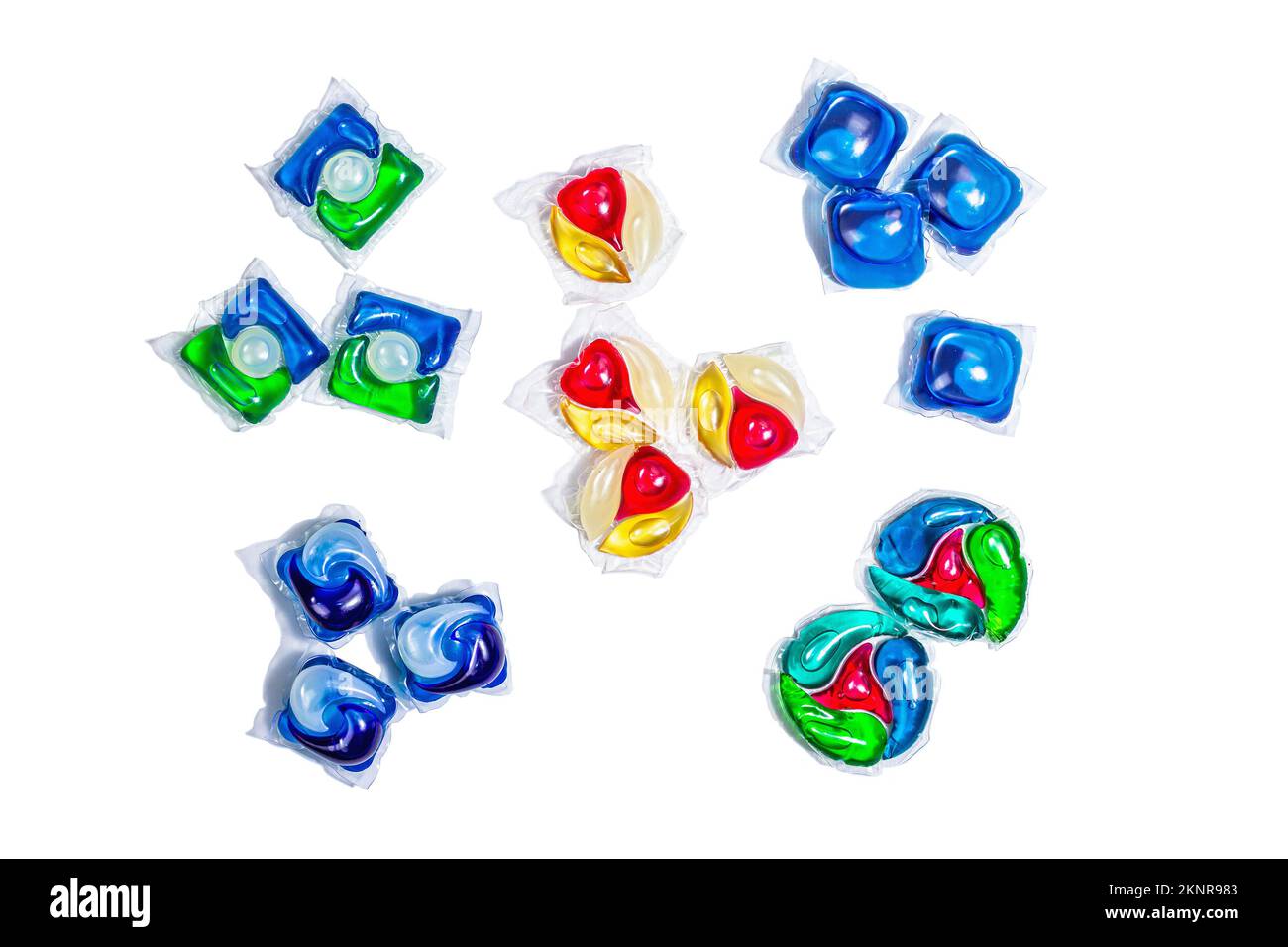 Assorted capsules with detergent for washing machine isolated on white ...