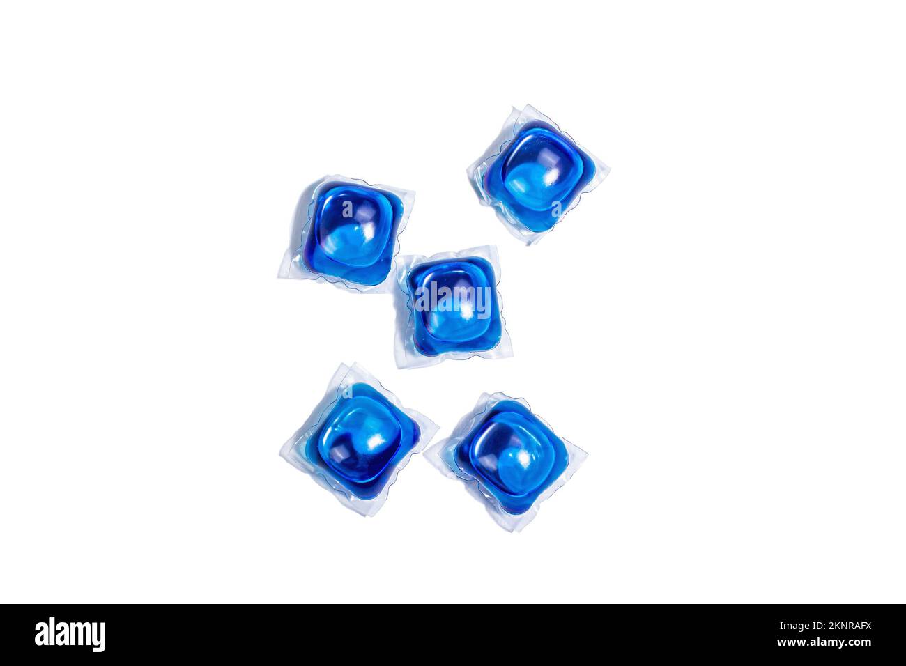 Capsules with detergent for washing machine isolated on white ...