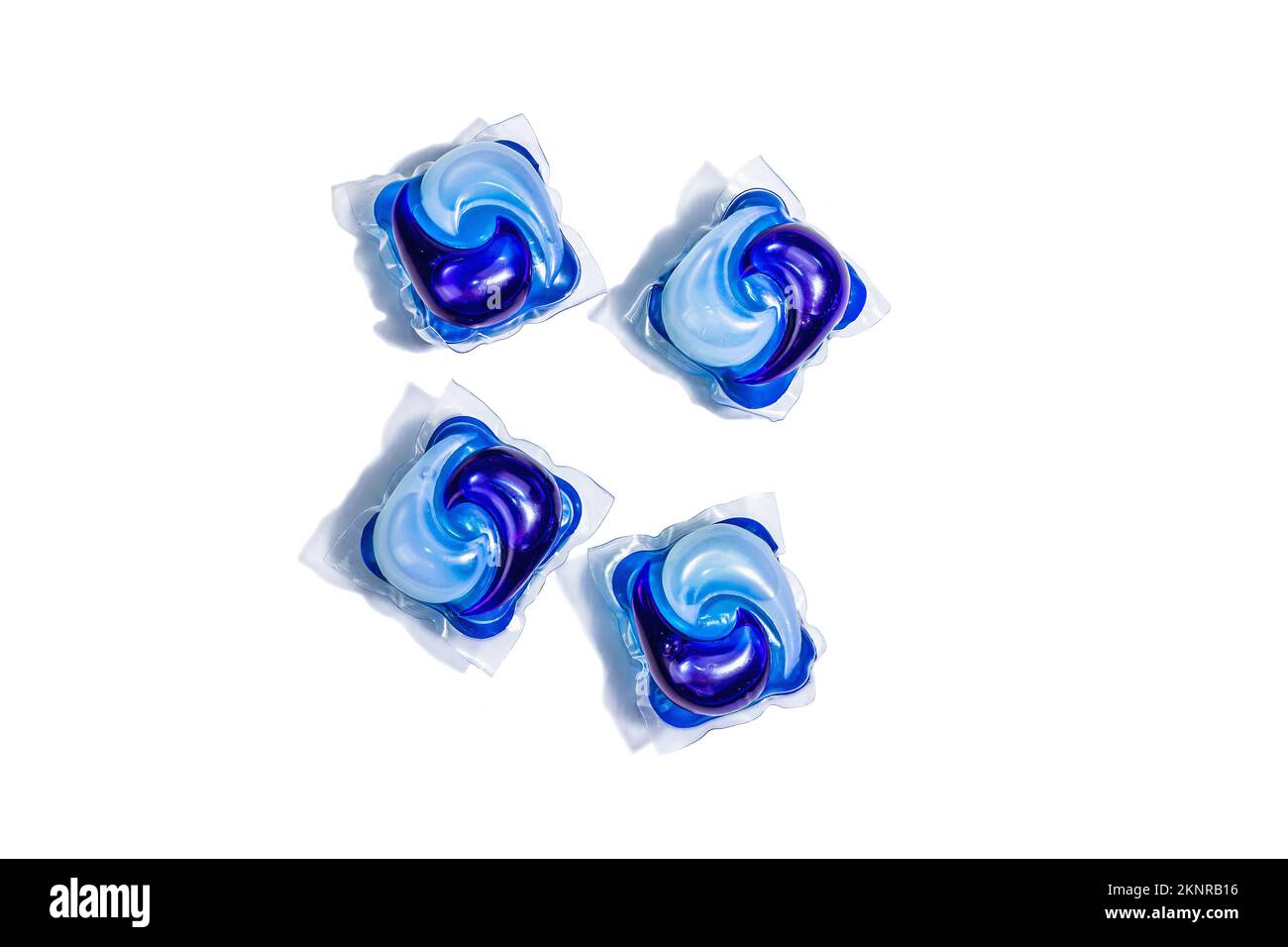 Capsules with detergent for washing machine isolated on white ...