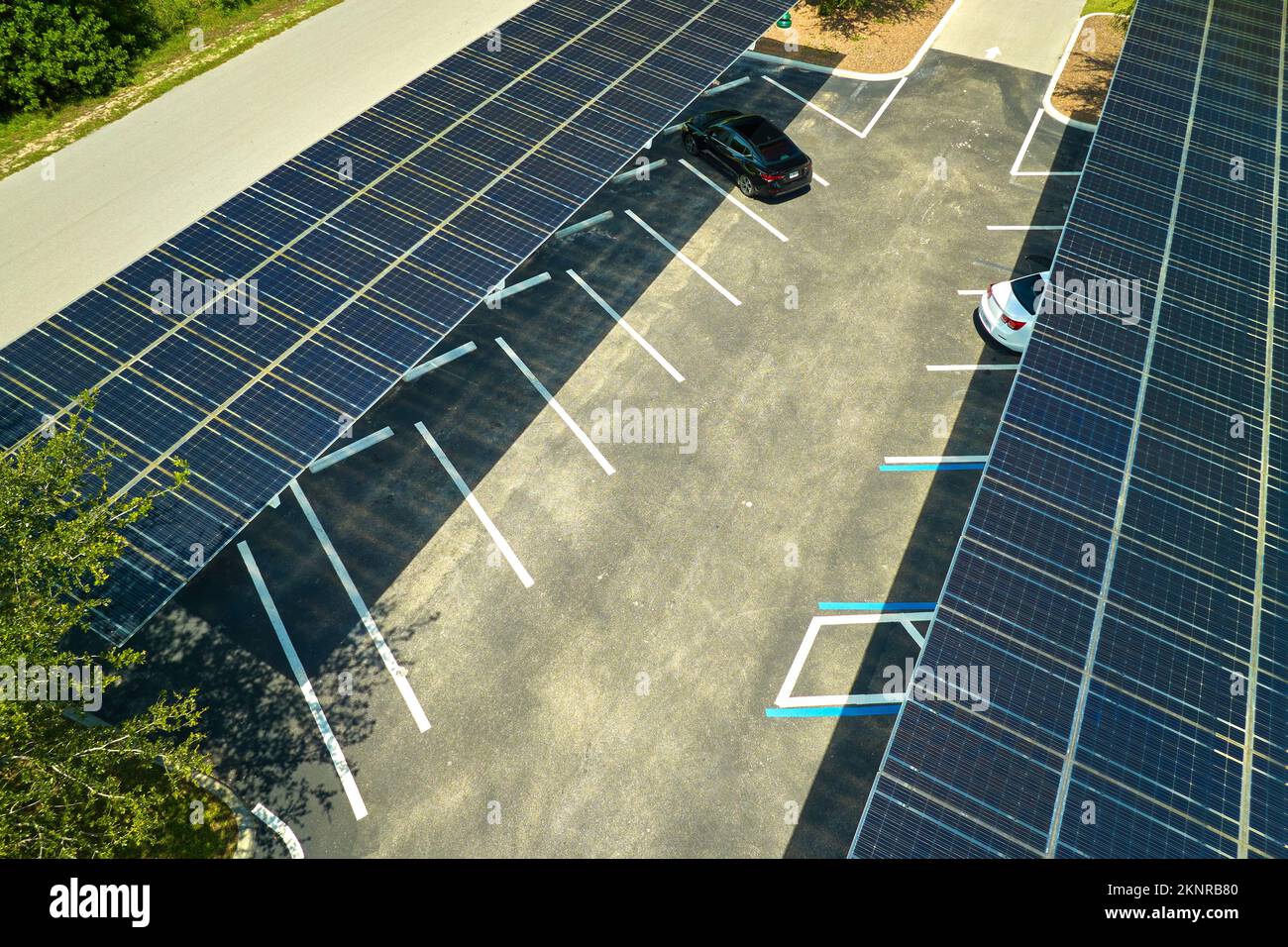 Aerial view of solar panels installed as shade roof over parking lot ...
