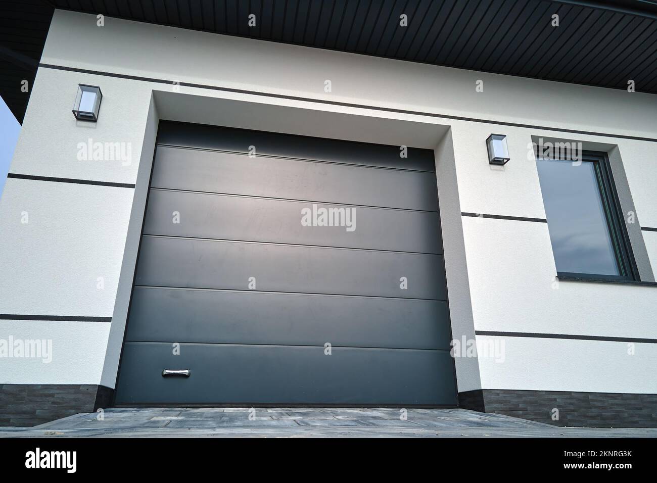 Automatic electric roll-up commercial garage gate or push-up door in ...