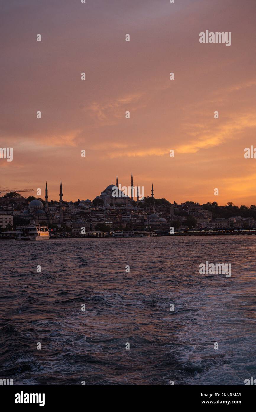 A beautiful view of Istanbul harbor at sunset during summer Stock Photo ...