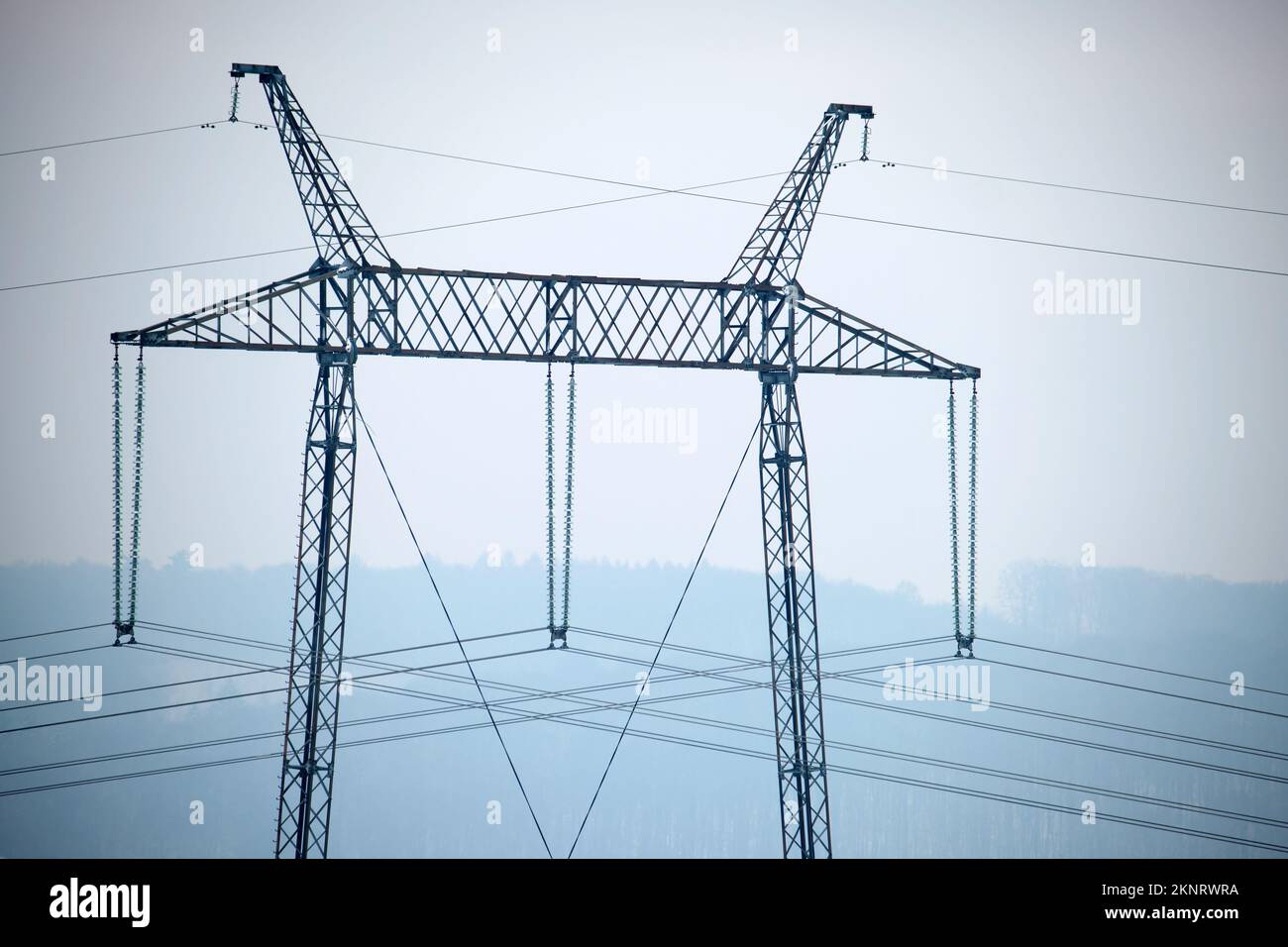 High voltage tower with electric power lines transfening electrical ...