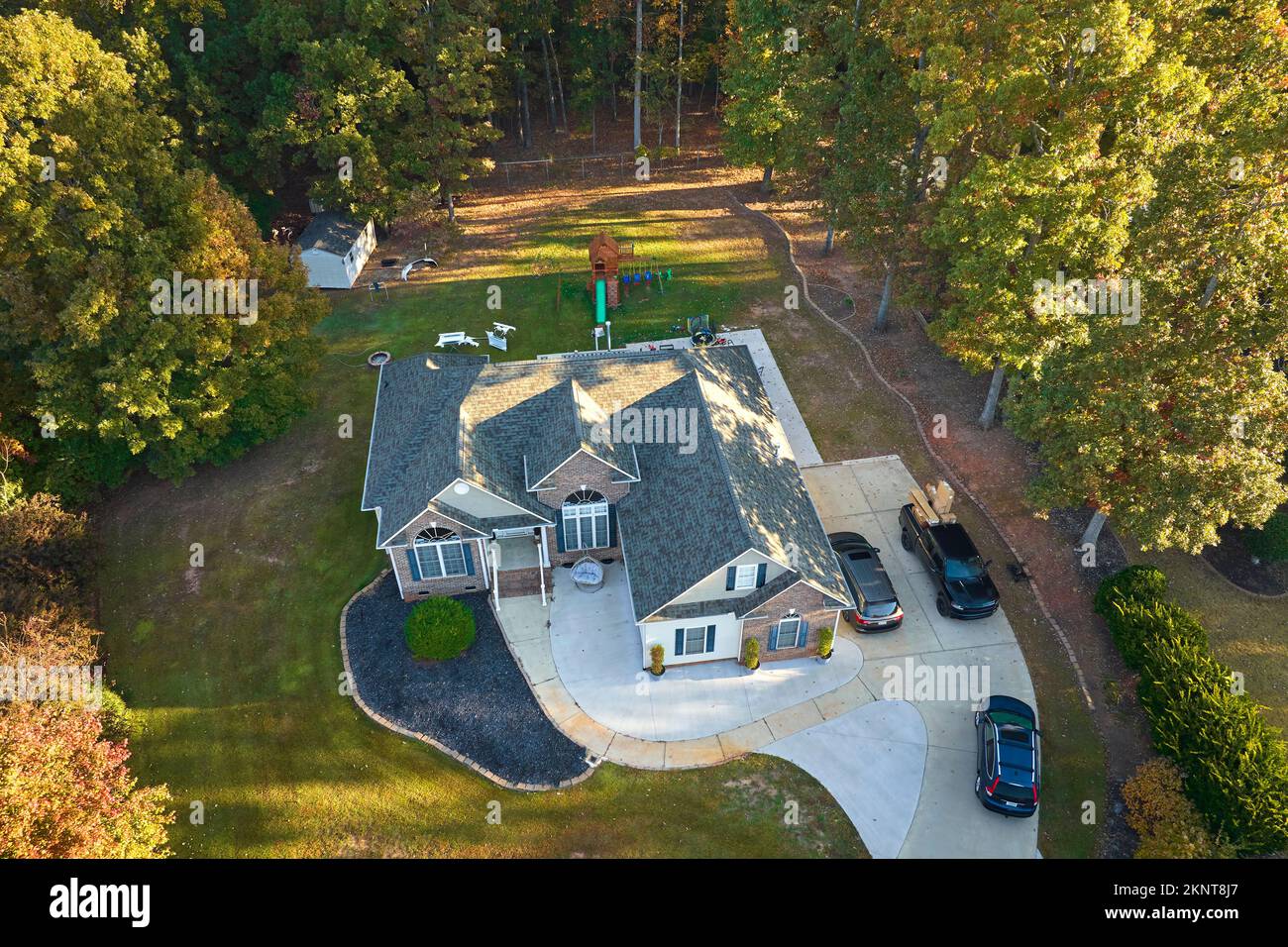 View from above of expensive residential house between yellow fall ...