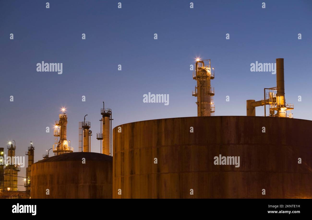 Oil refinery illuminated at dusk, Montreal East, Quebec, Canada Stock ...