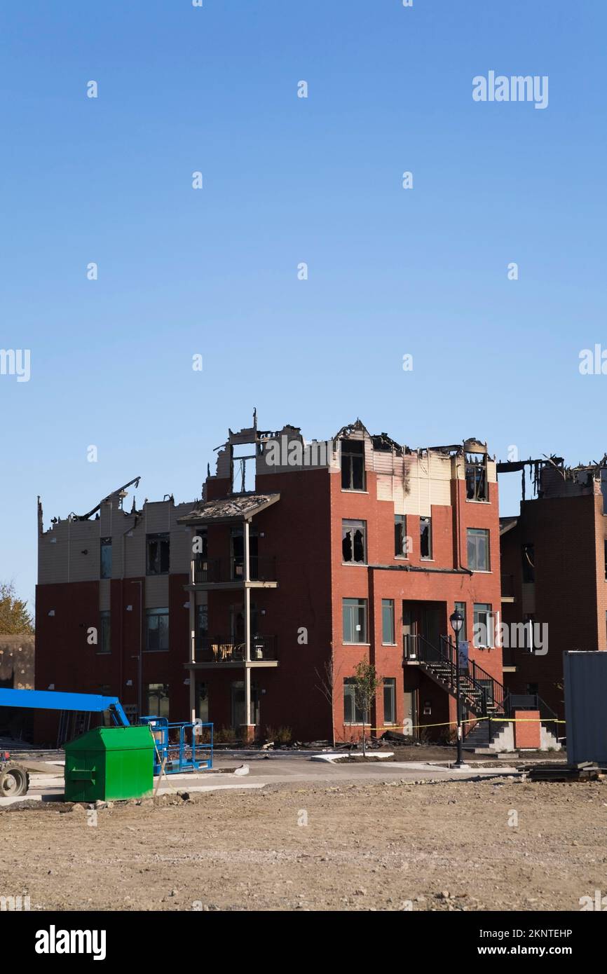 Fire damaged red brick condominium buildings Stock Photo - Alamy