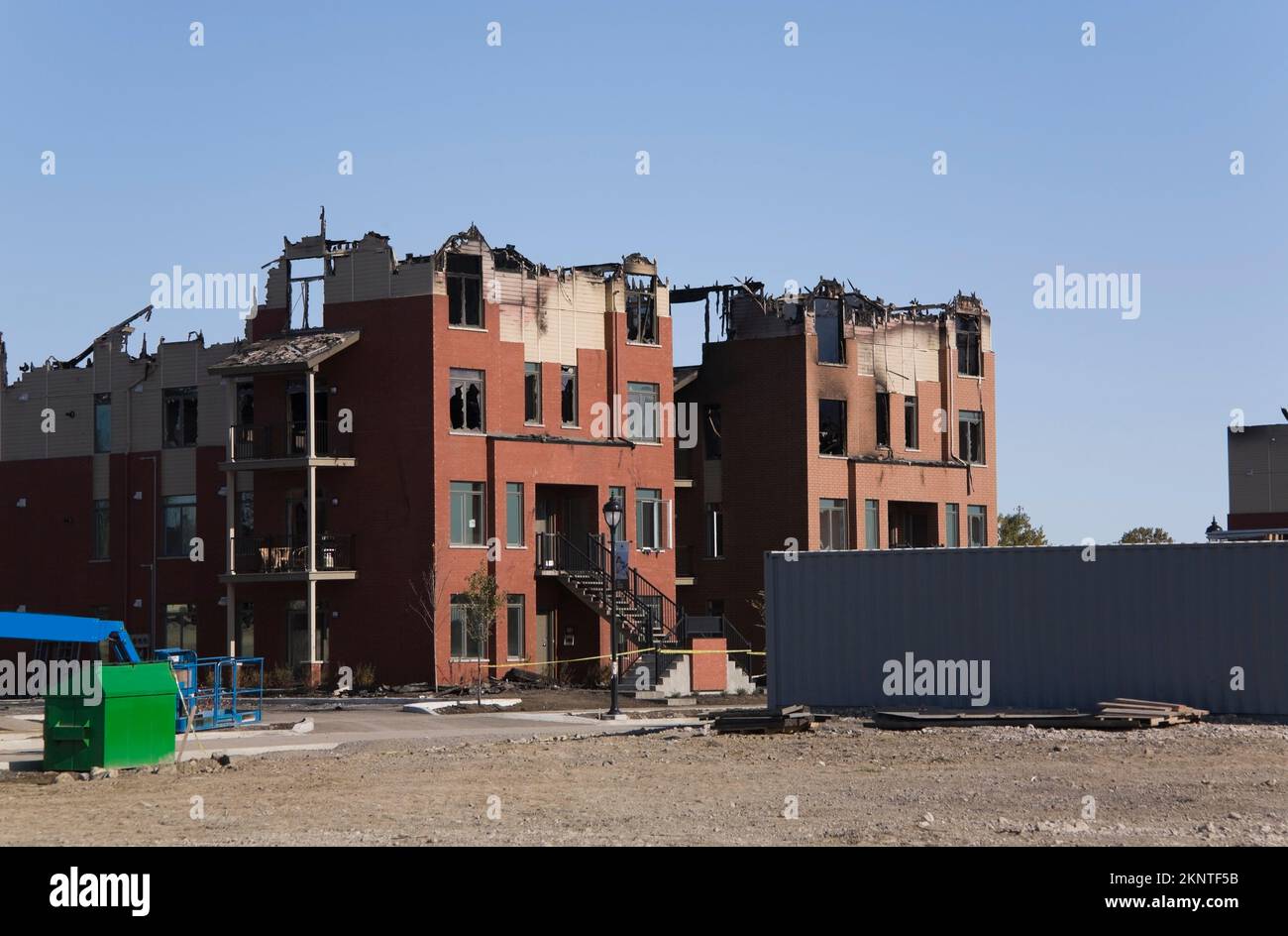 Fire damaged red brick condominium buildings Stock Photo - Alamy