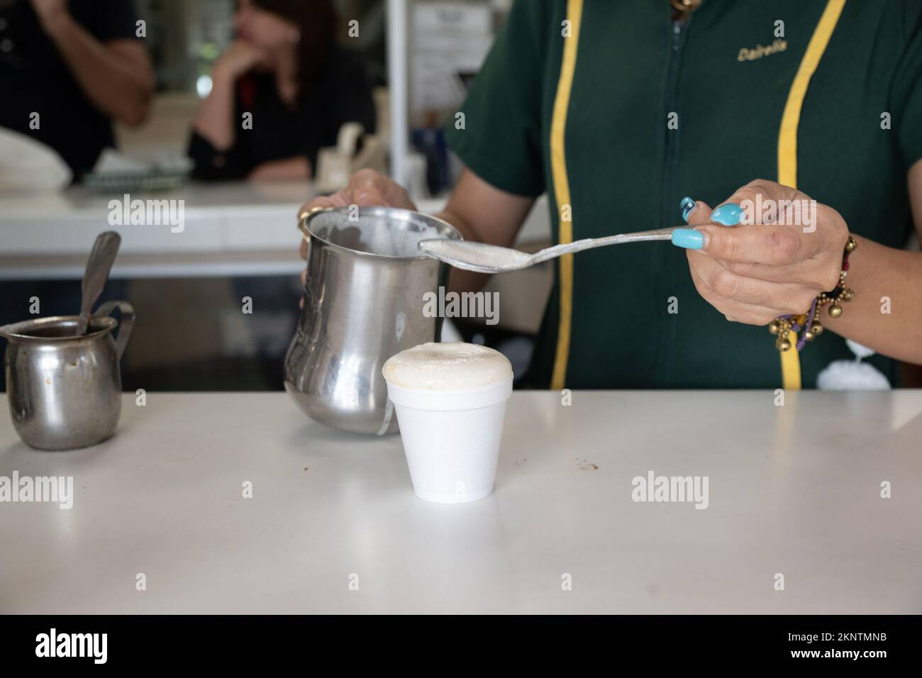 Miami, USA. 27th Nov, 2022. A server is making Cuban coffee at the ...