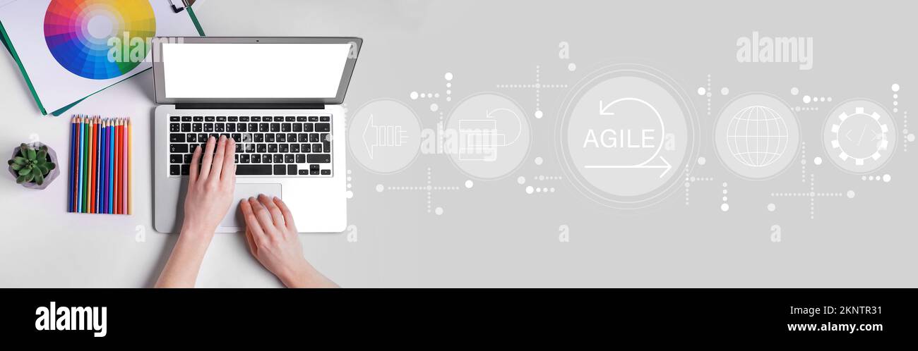 Female hands with modern laptop on grey background. Concept of agile ...
