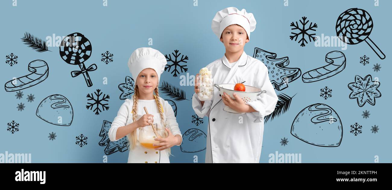 Cute little confectioners on light blue background Stock Photo - Alamy