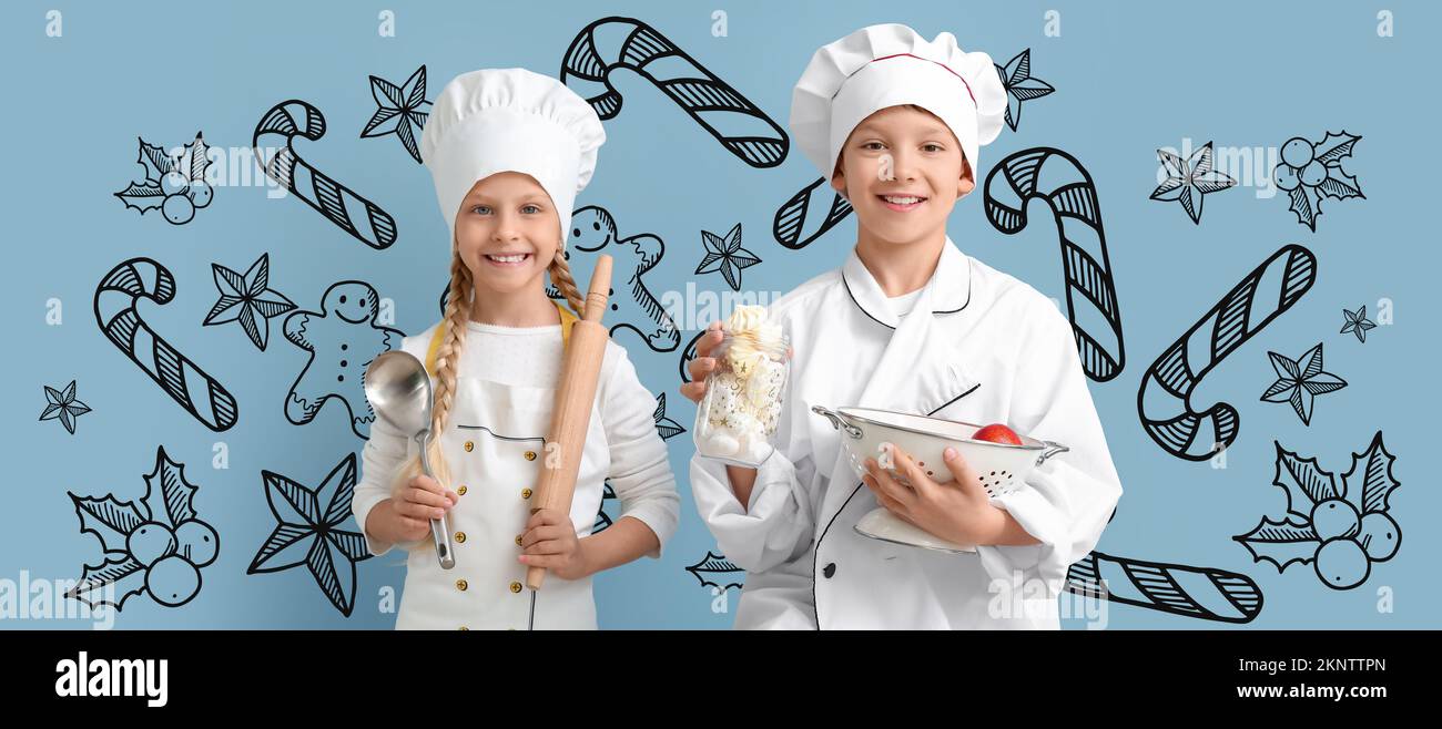 Cute little confectioners on light blue background Stock Photo - Alamy